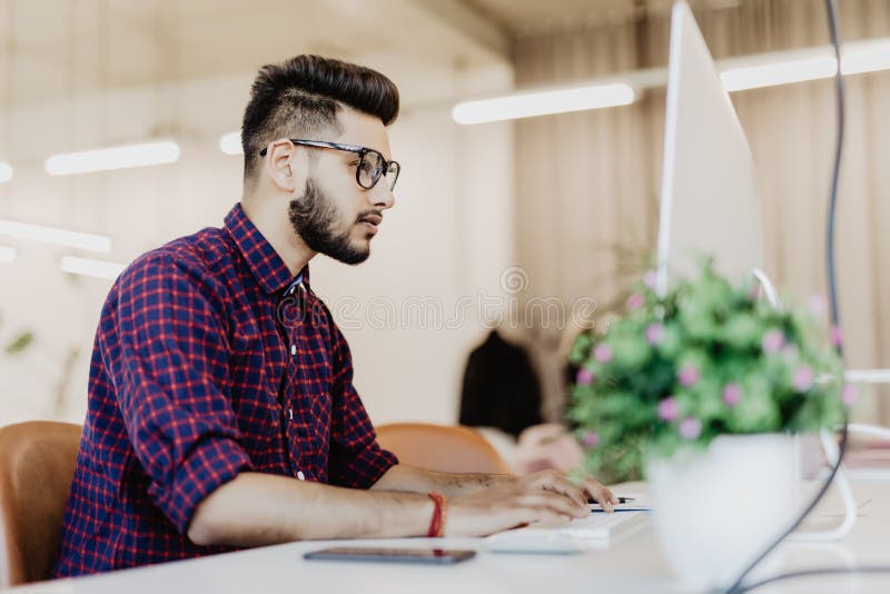 Indian Businessman Working on Computer in His Office Stock Image ...