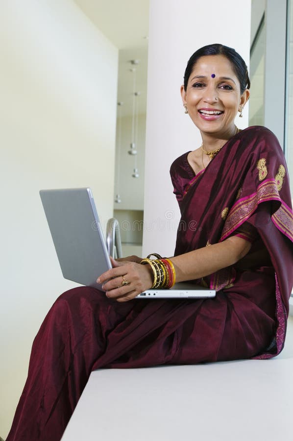 Indian Girl and Laptop Computer Stock Photo - Image of desk, adolescent ...