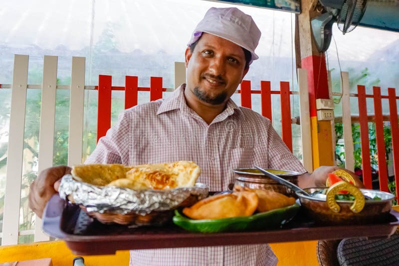 Indian chef serving food stock image. Image of cuisine - 81632593