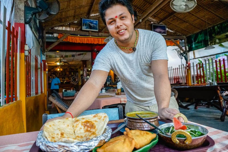 Indian chef serving food stock photo. Image of food, tray - 81633338