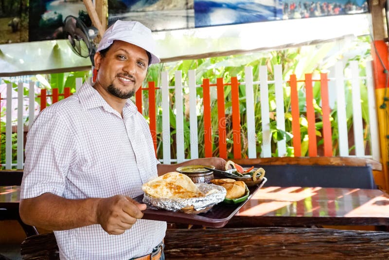 Indian chef serving food stock photo. Image of tray, asian - 81635598