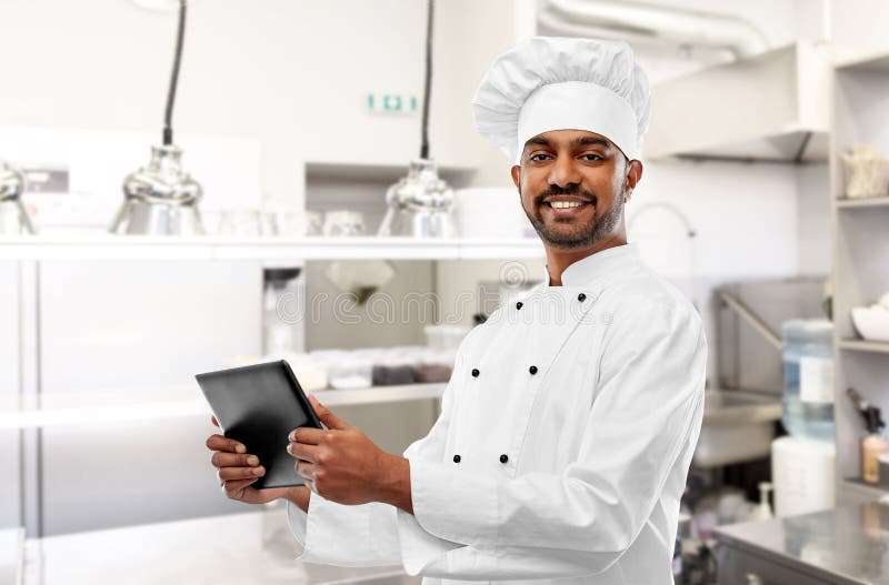 Indian Chef with Tablet Pc at Restaurant Kitchen Stock Photo - Image of ...