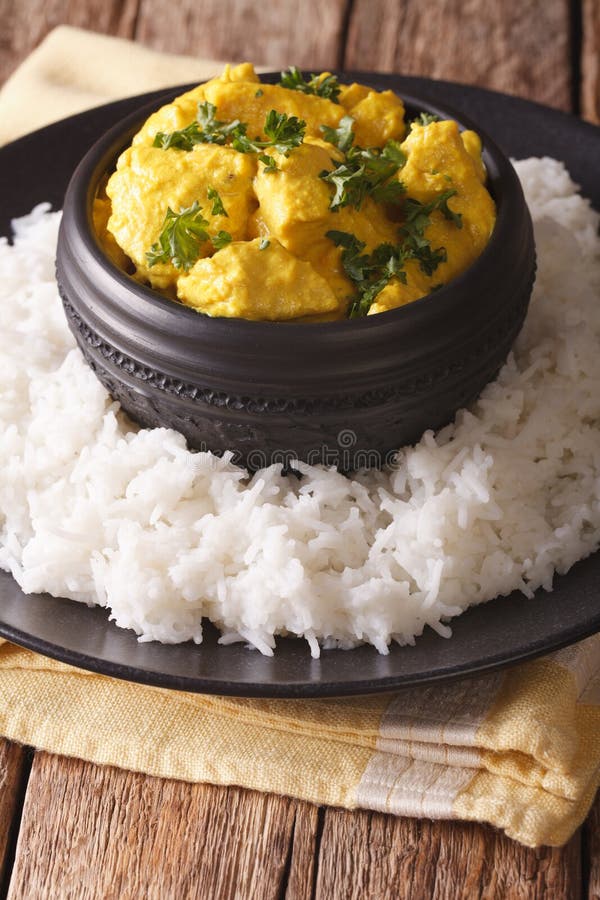 Indian Chicken Korma with Basmati Rice Close-up. Vertical Stock Image ...