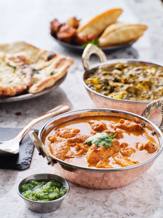 Indian Chicken Tikka Masala Curry and Saag Paneer Curries on Table Top ...