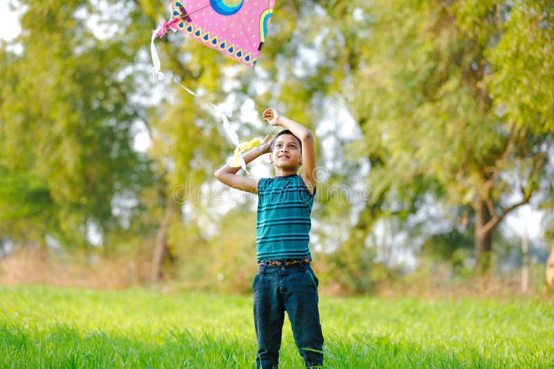 Indian Child Playing with Kite at Green Field Stock Photo - Image of ...