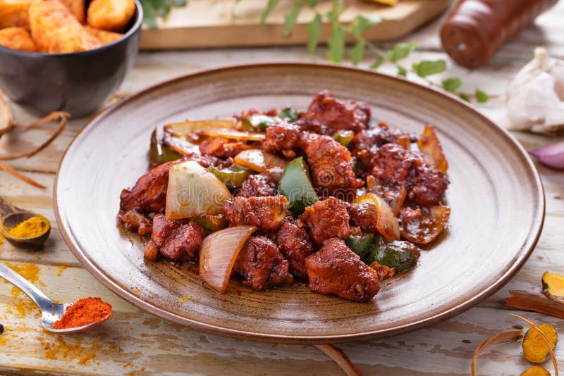 Indian Chili Chicken with Some Veggie Stock Photo - Image of cooked ...