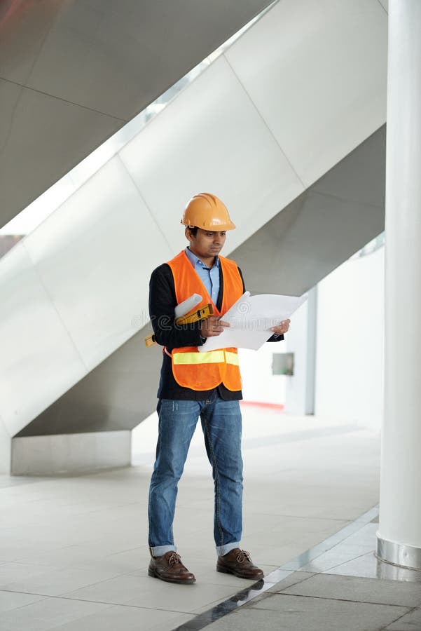 Engineer Checking Blueprint Stock Photo - Image of industry, site ...