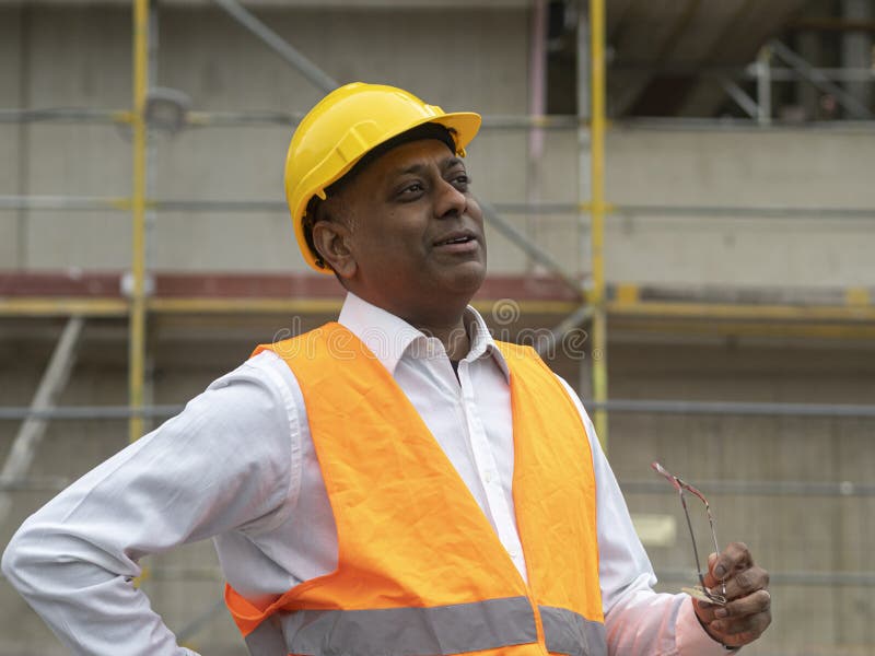 Indian construction worker stock photo. Image of industrial - 243878532