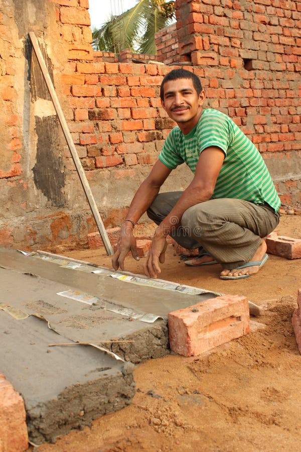 Indian construction worker editorial stock image. Image of rural - 32319174
