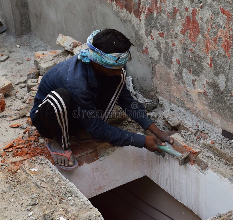 Indian Construction worker stock image. Image of site - 199092631