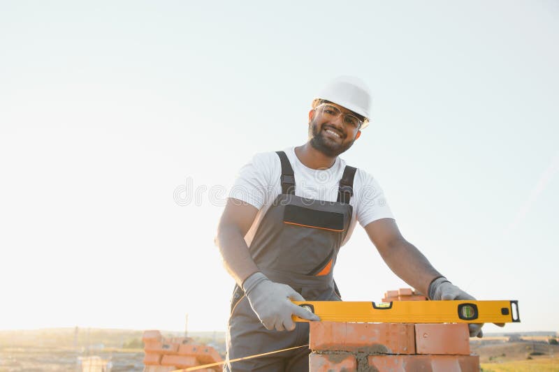 Indian Construction Worker Man in Work Clothes and a Construction ...