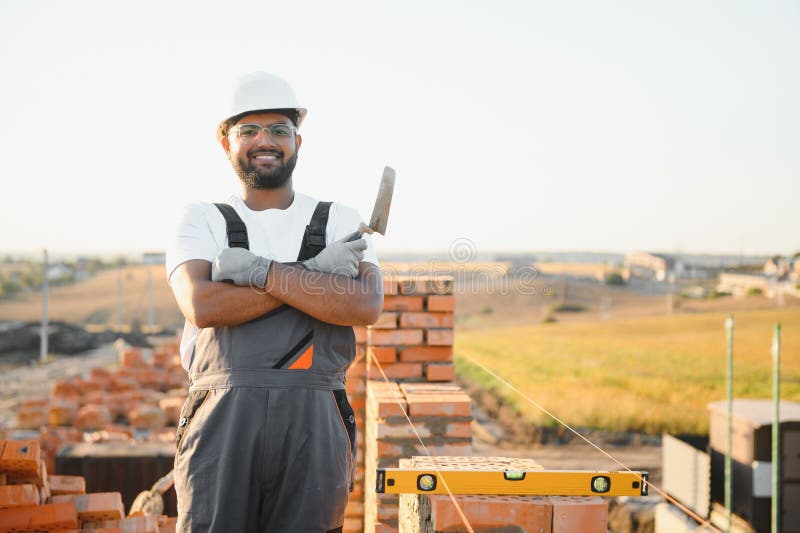 Indian Construction Worker Man in Work Clothes and a Construction ...