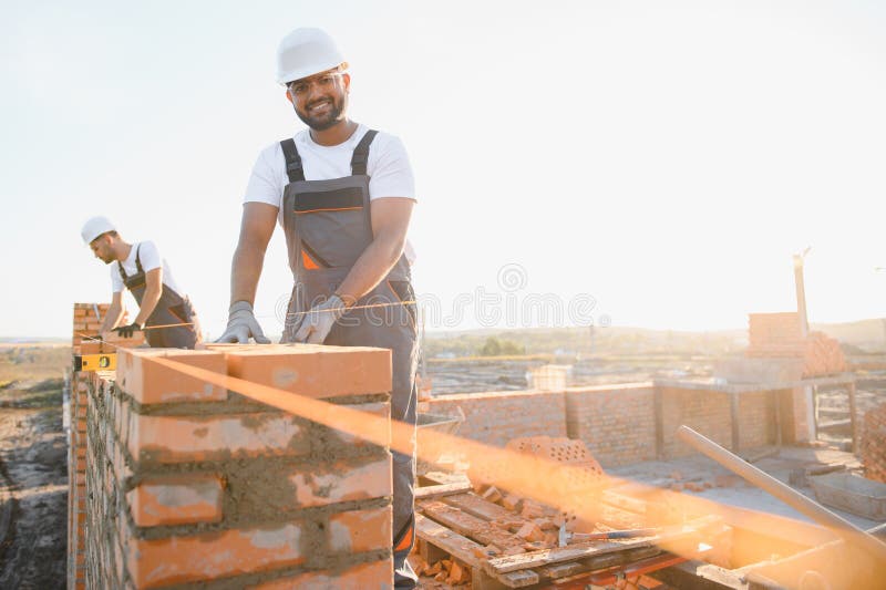 Indian Construction Workers Work on the Construction of a Brick House ...
