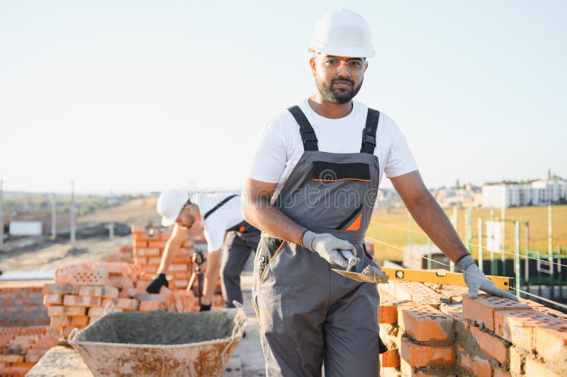 Indian Construction Workers Work on the Construction of a Brick House ...