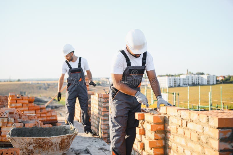 Indian Construction Workers Work on the Construction of a Brick House ...
