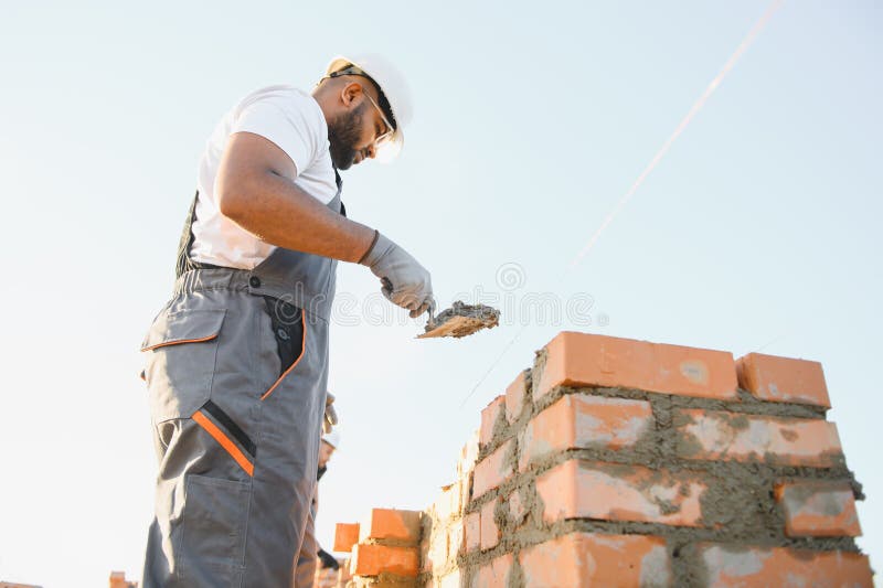 Indian Construction Workers Work on the Construction of a Brick House ...