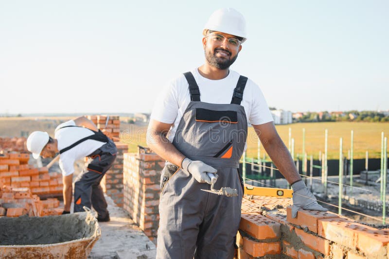 Indian Construction Workers Work on the Construction of a Brick House ...