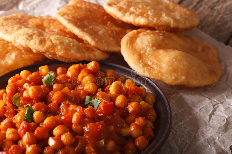 Indian Cuisine: Chana Masala and Puri Bread Close-up. Horizontal Stock ...