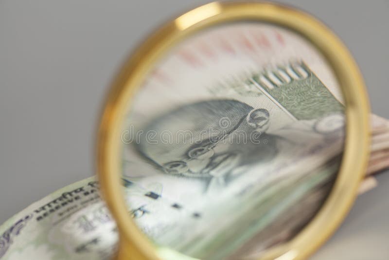 Indian Currency Rupee Notes with Magnifying Glass Stock Photo - Image ...