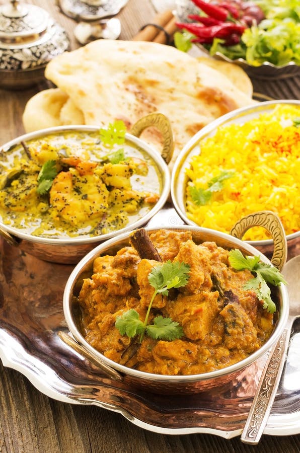 Indian Curries with Rice and Bread Stock Photo - Image of cardamom ...
