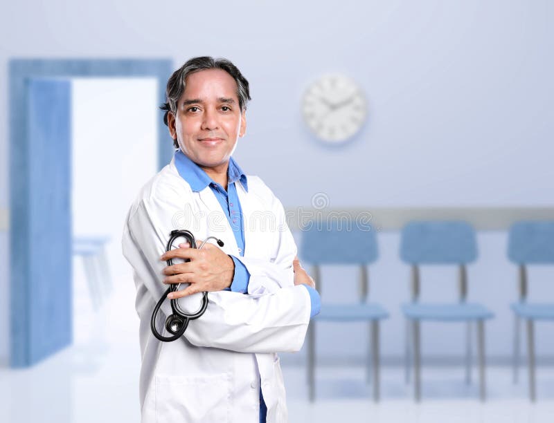 Indian Doctor with Stethoscope and Hospital in Background Stock Image ...