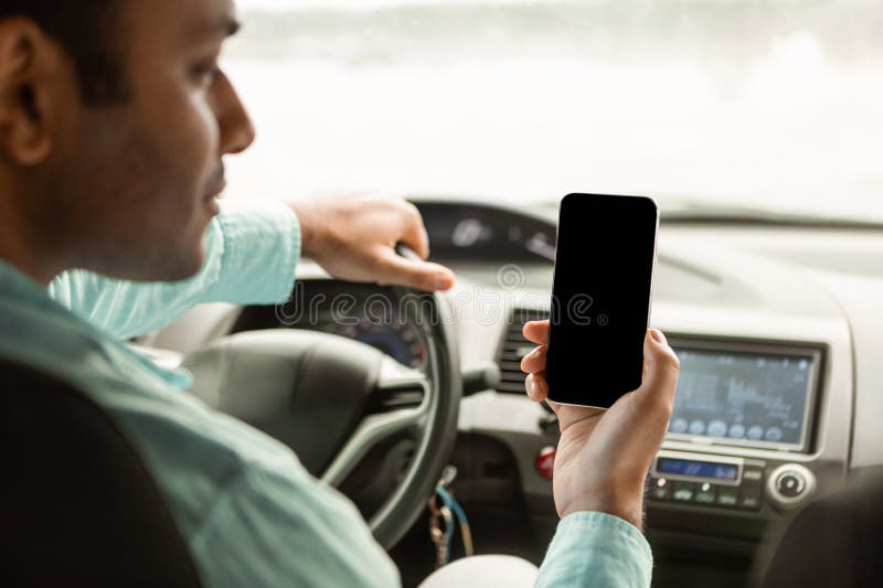 Indian Driver Man Using Smartphone with Empty Screen Driving Car Stock ...
