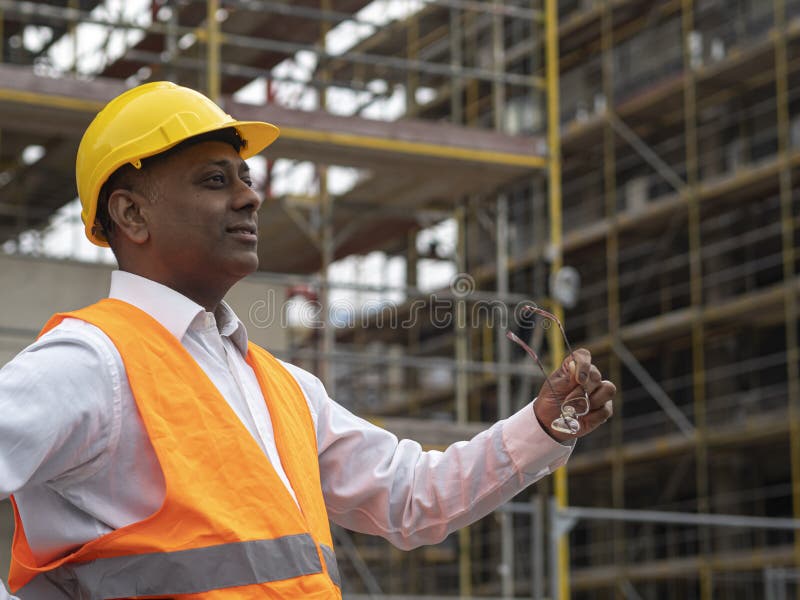 Indian construction worker stock photo. Image of engineer - 243878576
