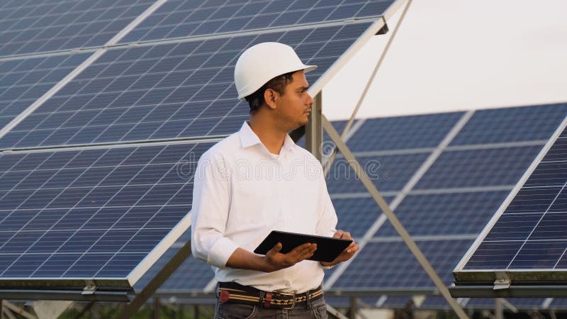 Indian Engineer is Working with Tablet at Solar Station Stock Footage ...