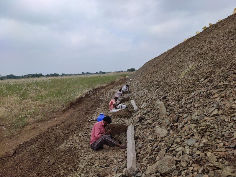 Indian Farmer Digging Pits for Stone Pillars Editorial Stock Image ...