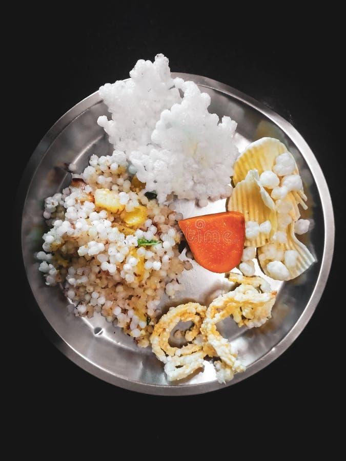 Indian Fast Dishes Like Sago, Patato Chips, Mango Stock Image - Image ...