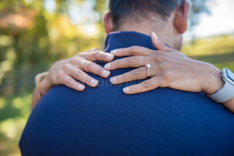 Indian Female Hands Over the Shoulder of Her Husband Stock Image ...