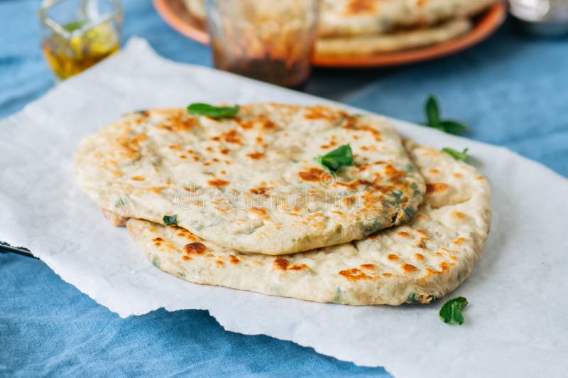 Indian Flatbread.Herb Stuffed Paratha on a Baking Paper Stock Image ...