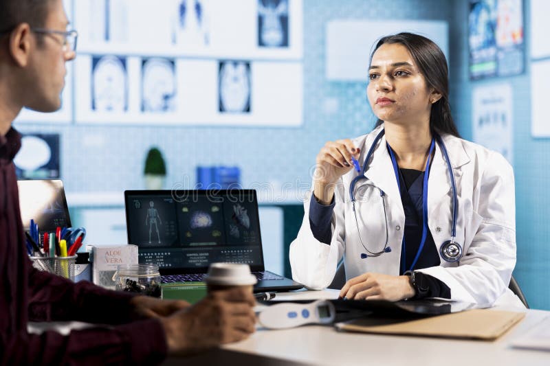 Indian General Practitioner and Patient Engage in a Medical ...