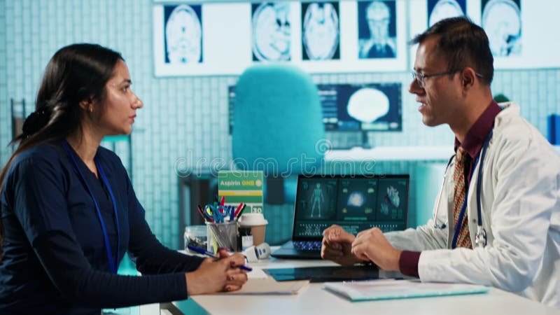Indian General Practitioner and Patient Engage in a Medical Consultation Stock Footage - Video ...