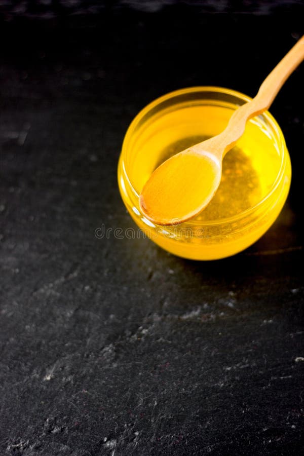 Indian Ghee in a Transparent Glass Bowl. Stock Image - Image of golden ...