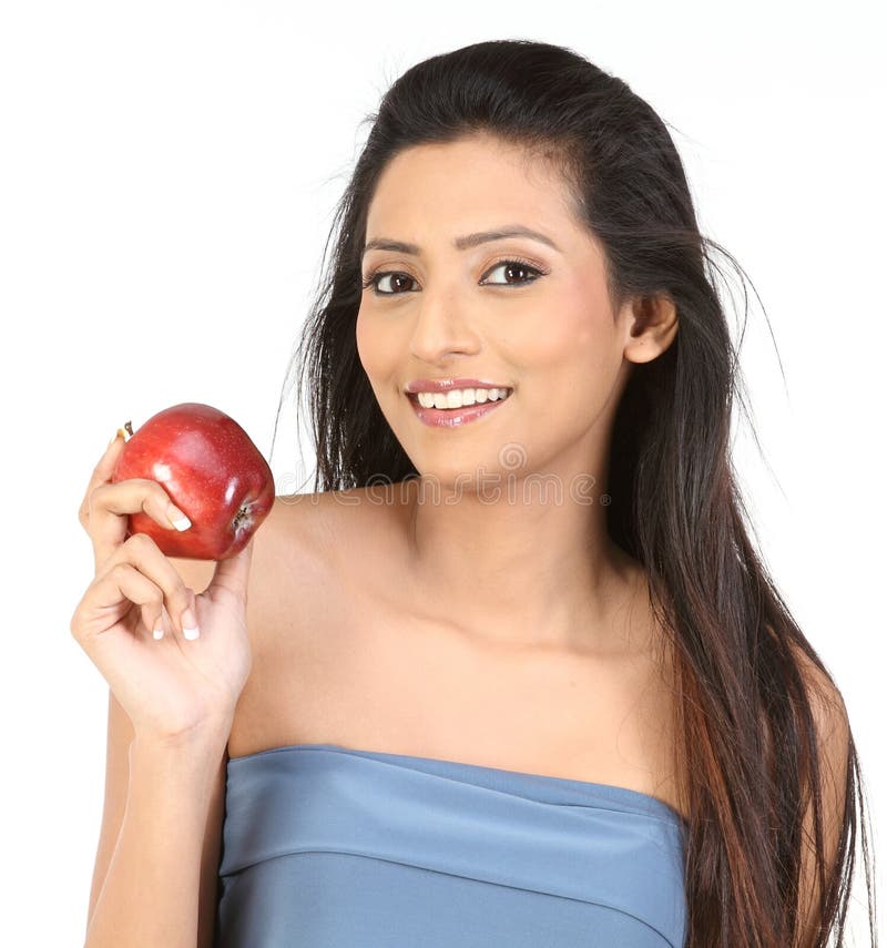 Indian girl with red apple stock image. Image of copy - 12418765