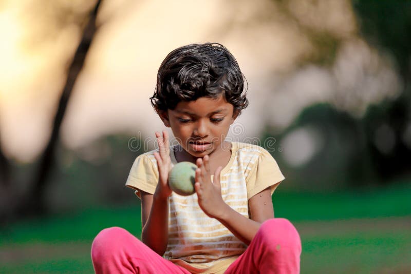 Indian Girl Child Playing with Ball Stock Photo - Image of maharashtra ...