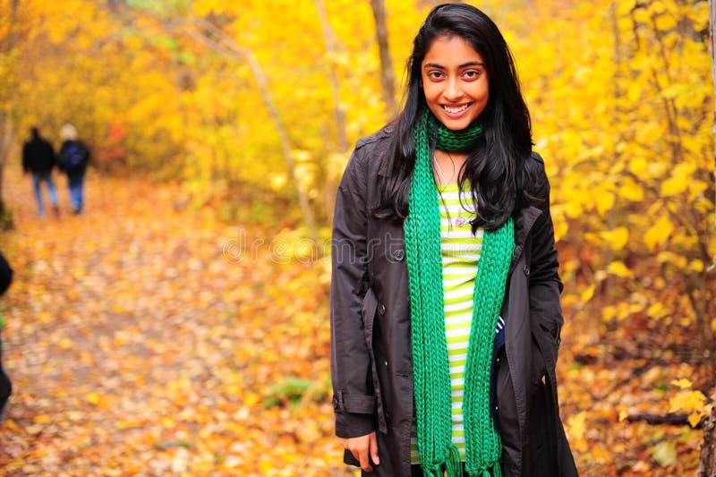Indian Girl in Fall Season stock photo. Image of enjoy - 27059556