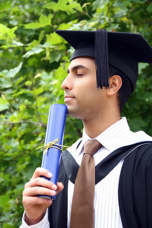 Indian Guy in a Graduation Gown. Stock Image - Image of graduating ...