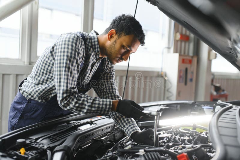 Indian Happy Auto Mechanic in Blue Suit. Stock Photo - Image of gearbox ...