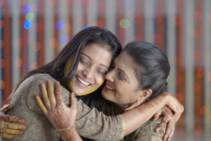 Indian Hindu Bride with Turmeric Paste on Face Hug Stock Photo - Image ...