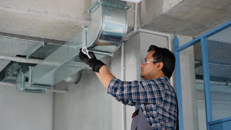Indian Hvac Worker Install Ducted Pipe System for Ventilation and Air ...