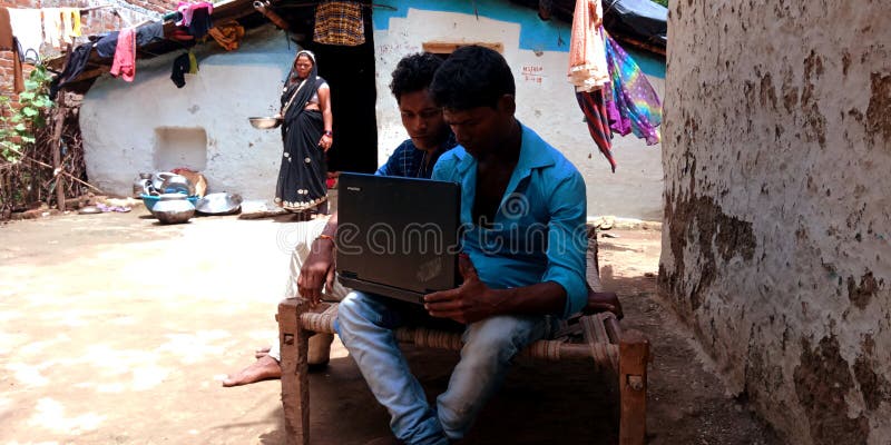 An Indian Illiterate People Operating Laptop Computer System Seating at ...