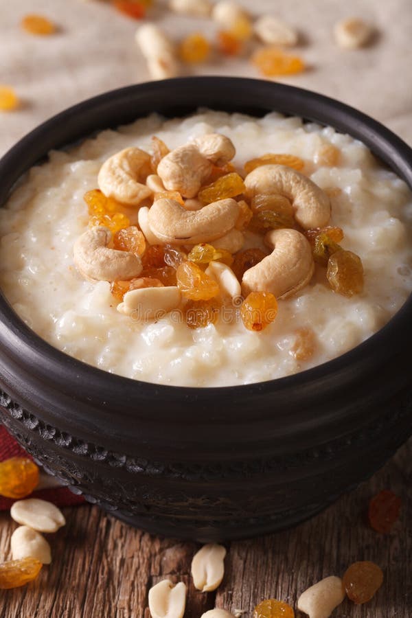 Indian Kheer Sweet Rice Pudding with Nuts Macro. Vertical Stock Image ...