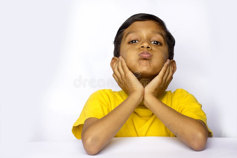 Indian Kid with Facial Expression Stock Image - Image of pride, desk ...
