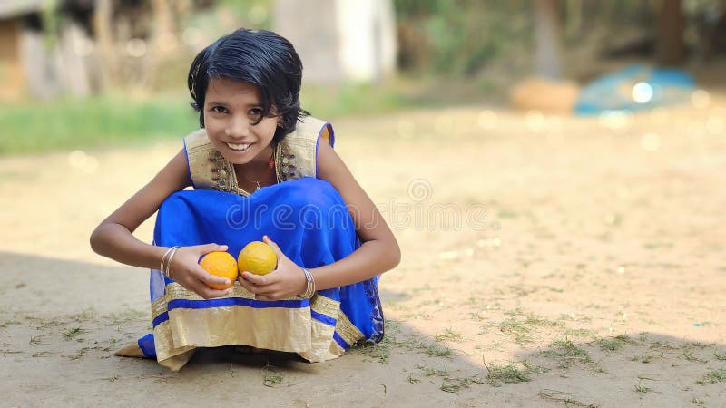 Kid Playing with Fresh Oranges and Smiling while Looking at the Camera ...