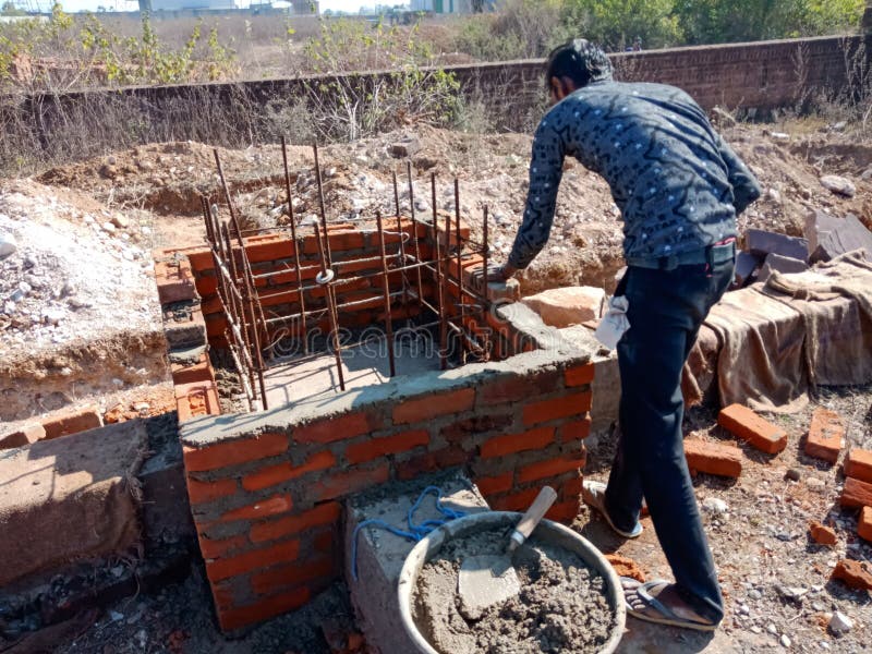 An Indian Labour Fixing Wall from Cement Material and Bricks in India ...