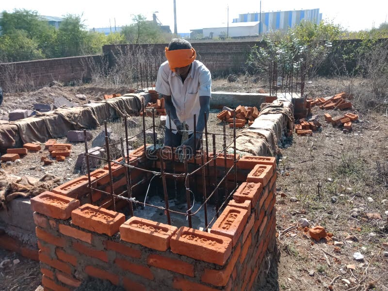 An Indian Labour Fixing Wall from Cement Material and Bricks in India ...