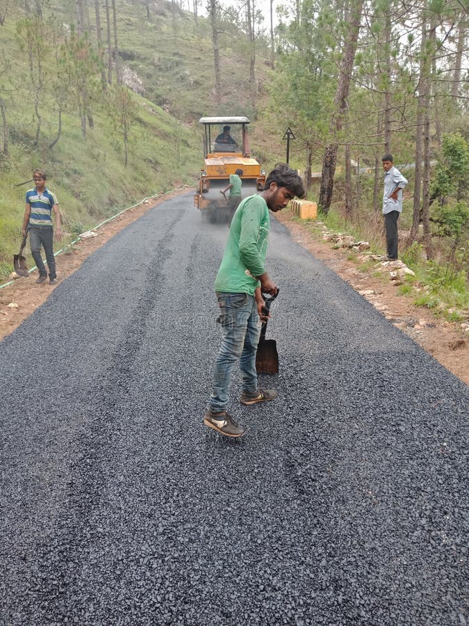 An Indian Labour Pushing Loaded Rickshaw on Raod at District Katni in ...