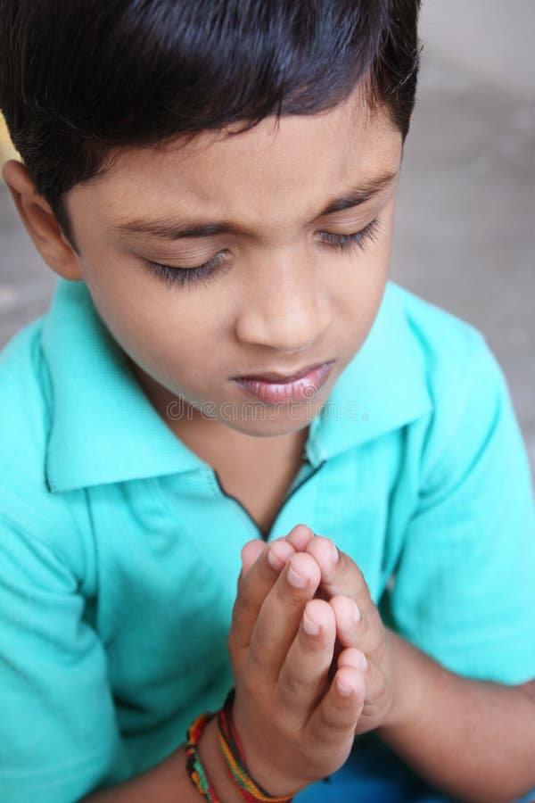 Indian Boy Praying stock photo. Image of asian, devotion - 34612664